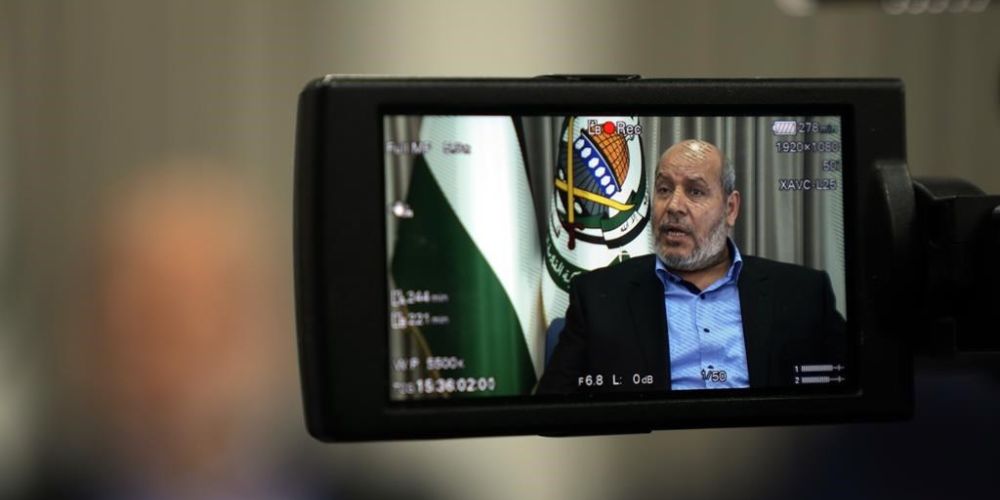 Hamas official says group would lay down its weapons if a two−state ...