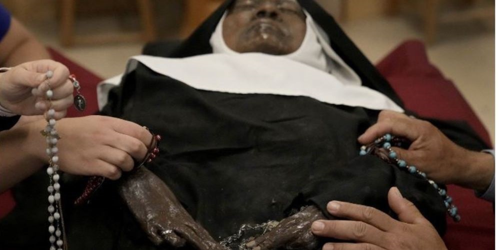 Nun whose body shows little decay since 2019 death draws hundreds to ...