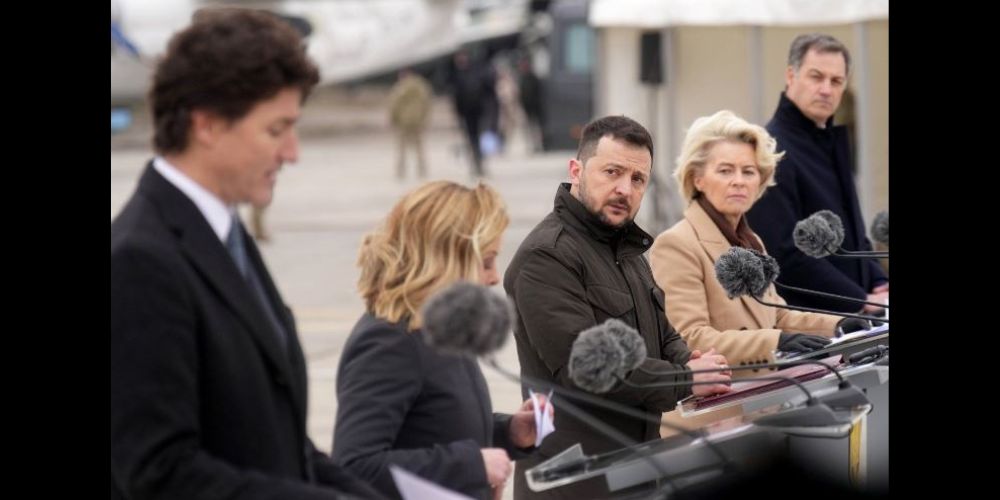 Trudeau signs support pact, attacks 'weakling' Putin in unannounced ...