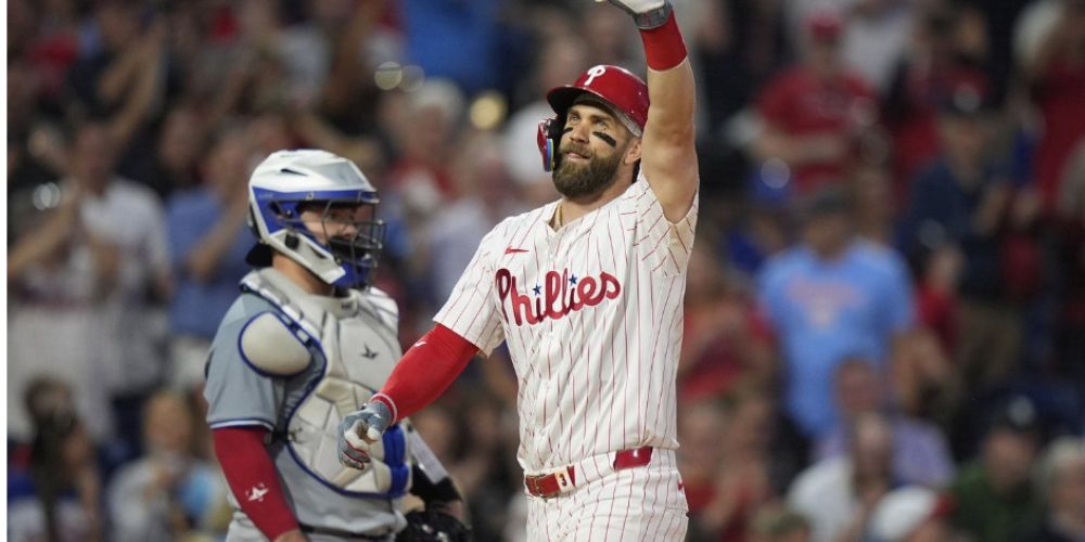 Harper hits grand slam, streaking Phillies rout Blue Jays 10-1