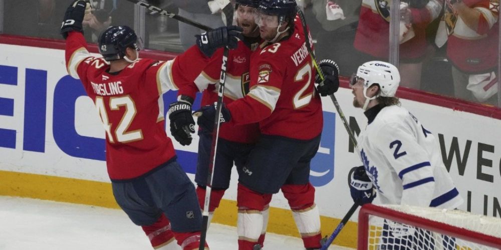 Marchand scores in OT, Panthers top Maple Leafs 5-4 to cut series ...