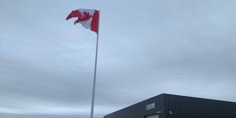 True patriot love. Large Canadian flag raised in Barrie symbolizes a ...