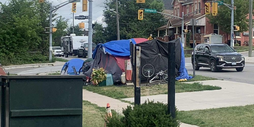 'They're just trying to survive': Tents line Mulcaster St., near ...