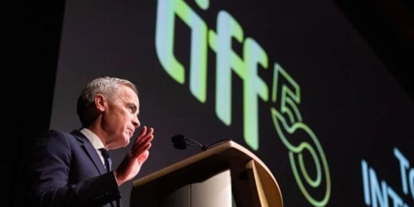 Prime Minister Mark Carney honours John Candy, takes swipe at Trump to open TIFF's 50th edition