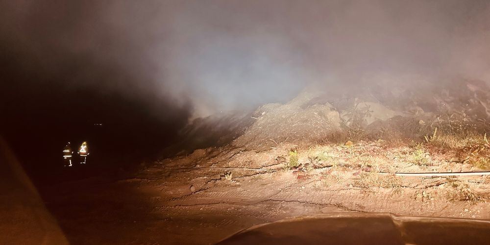 Springwater fire crews battle flames in wood chip pile